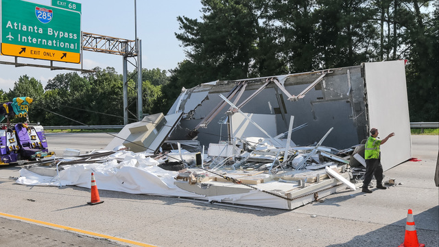 Prefabricated building falls off truck, blocks interstate | WSB-TV