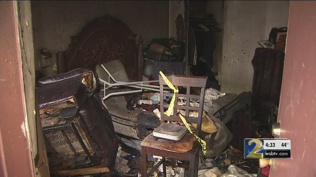 Firefighters rescue man through window during apartment fire | WSB-TV