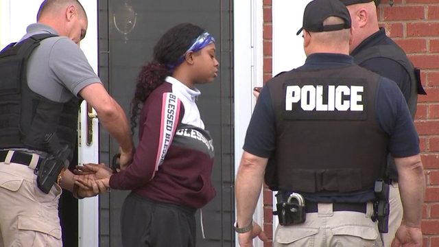 Woman arrested in fraud raid: 'I don’t know what the (expletive ...